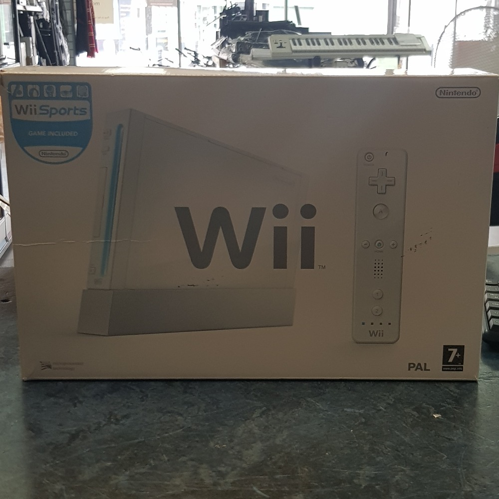 Pre-owned Nintendo Wii bundle w/ wii fit and games - Own4Less